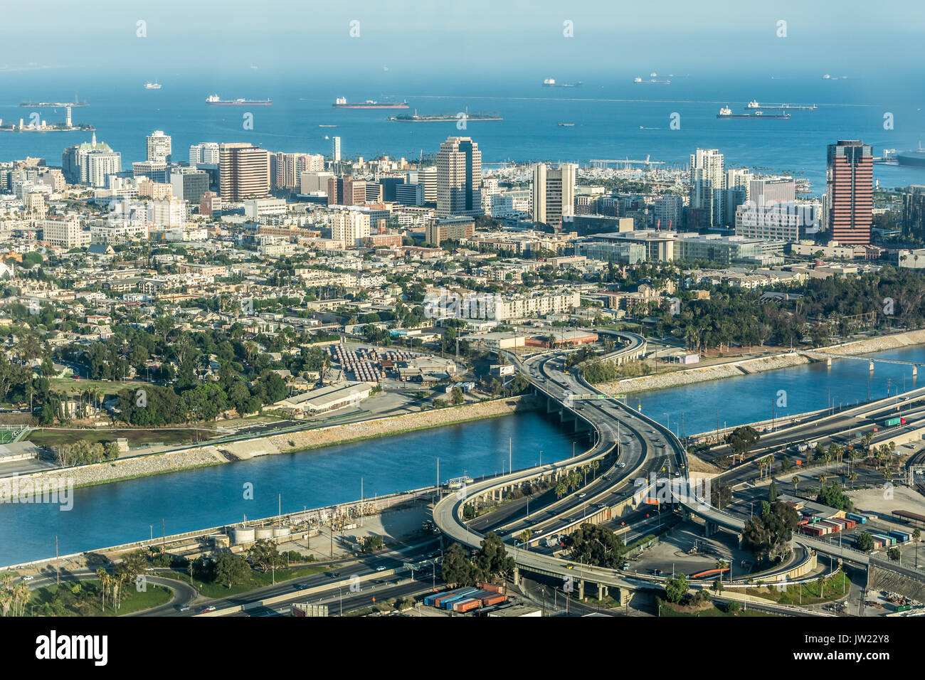 Aerial view of Downtown Long Beach from helicopter flying south along ...