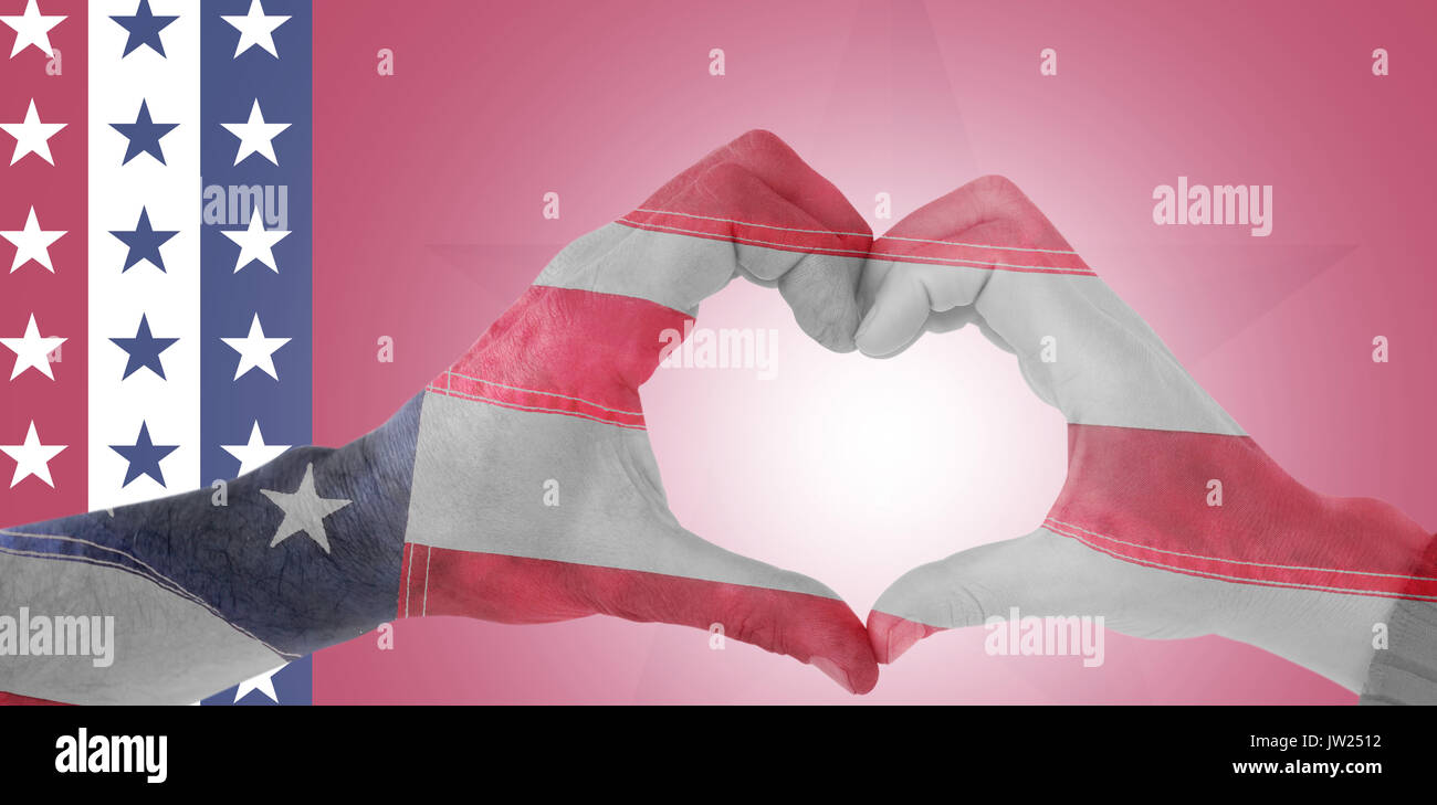 Couple making heart shape with hands against close-up of an flag Stock ...