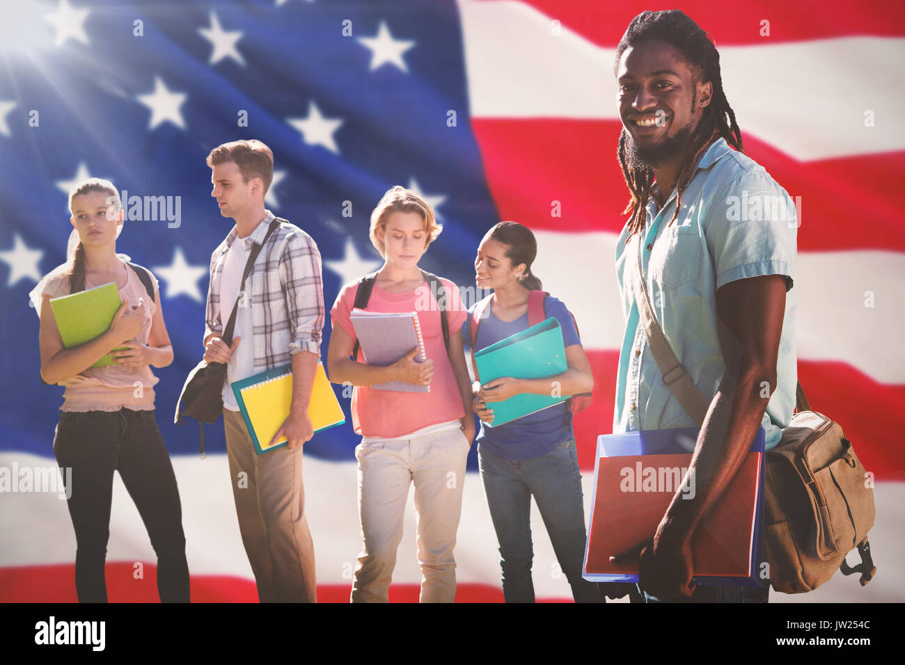 Happy students outside on campus against close-up of us flag Stock ...