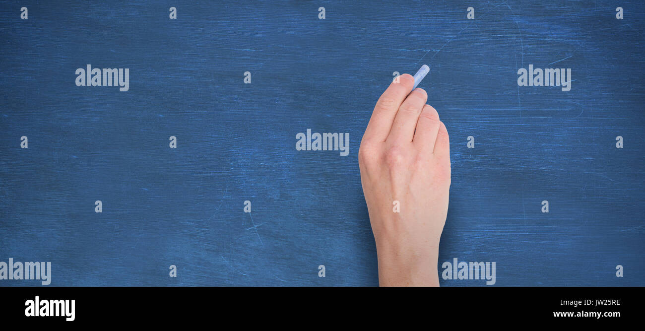 Hand writing with blue chalk against blue background Stock Photo - Alamy
