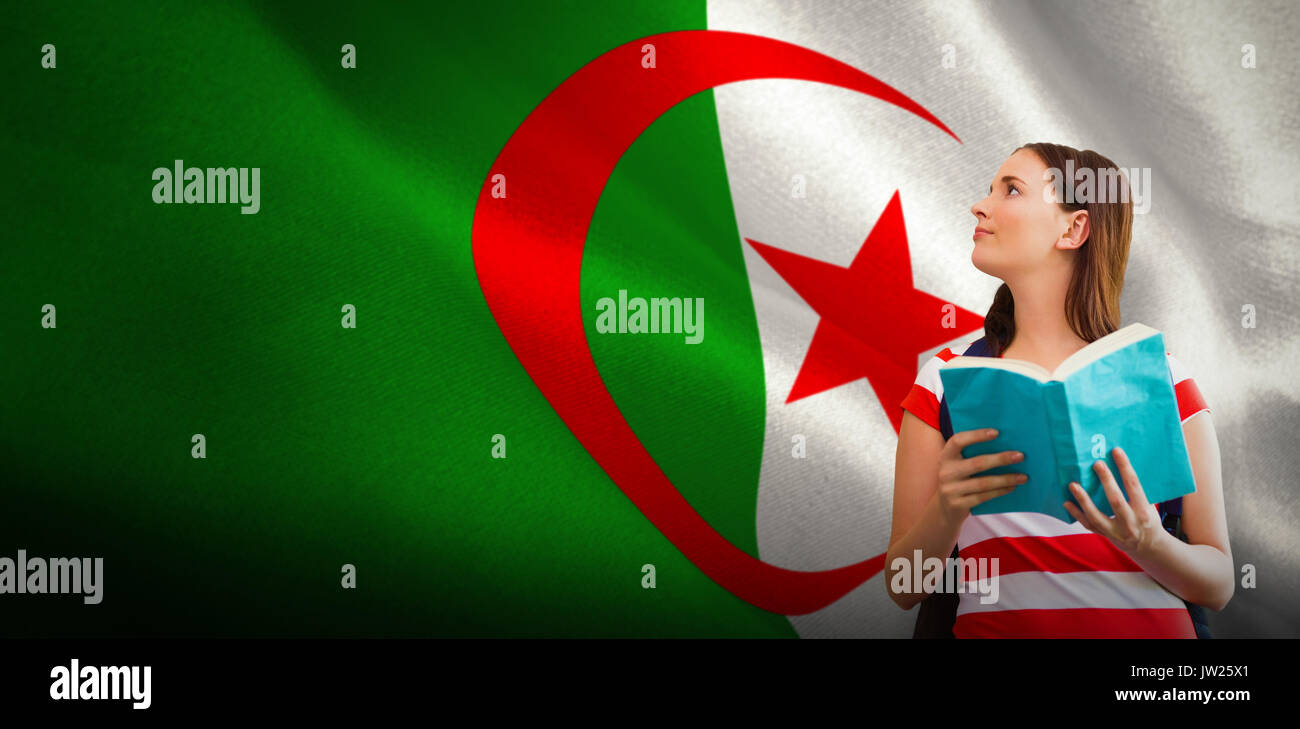 Student reading book in library against digitally generated algerian ...