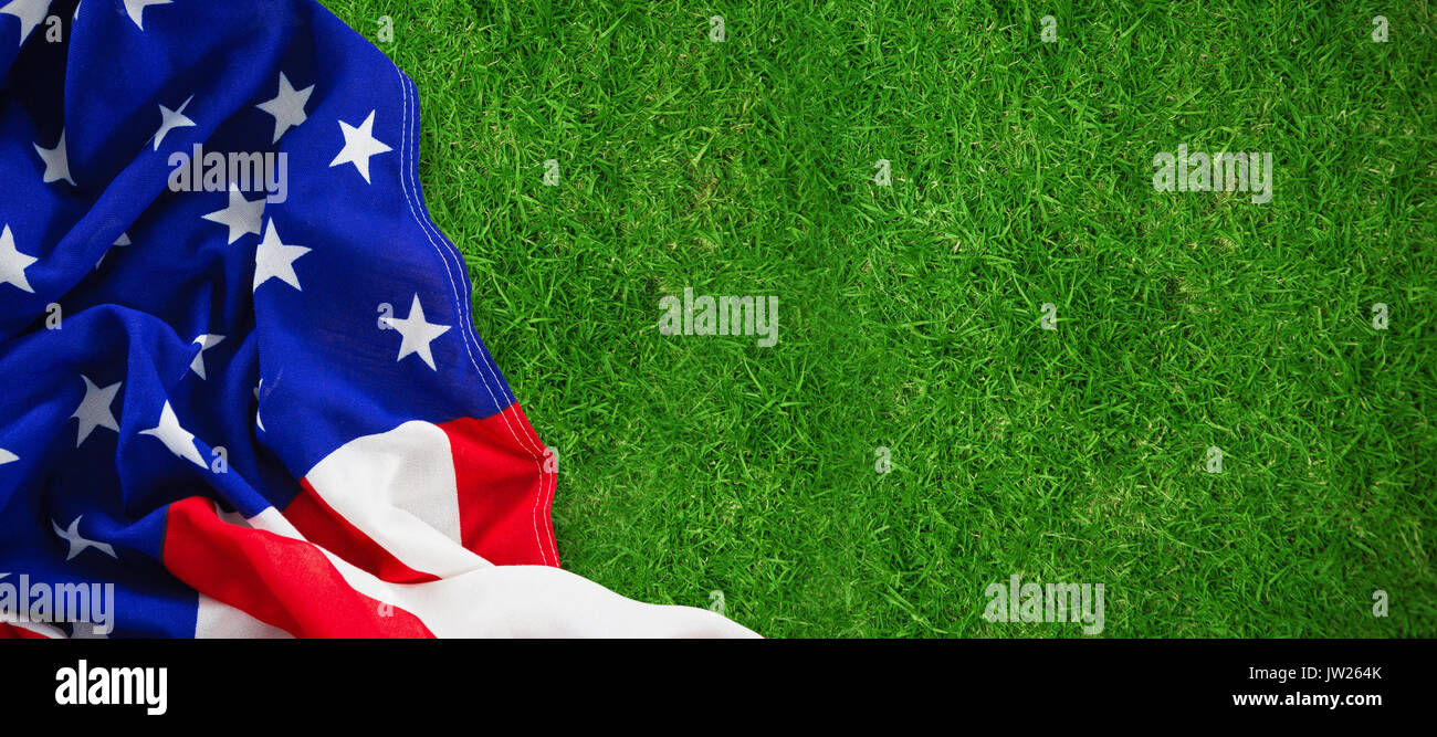 Close-up of American flag against closed up view of grass Stock Photo ...