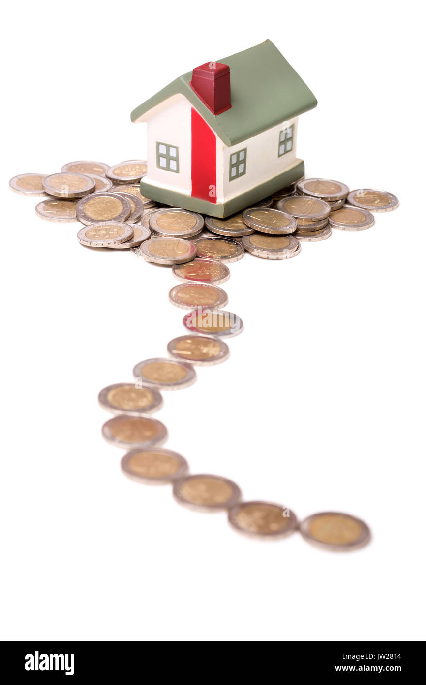 small house and coins, concept, isolated on white background Stock ...