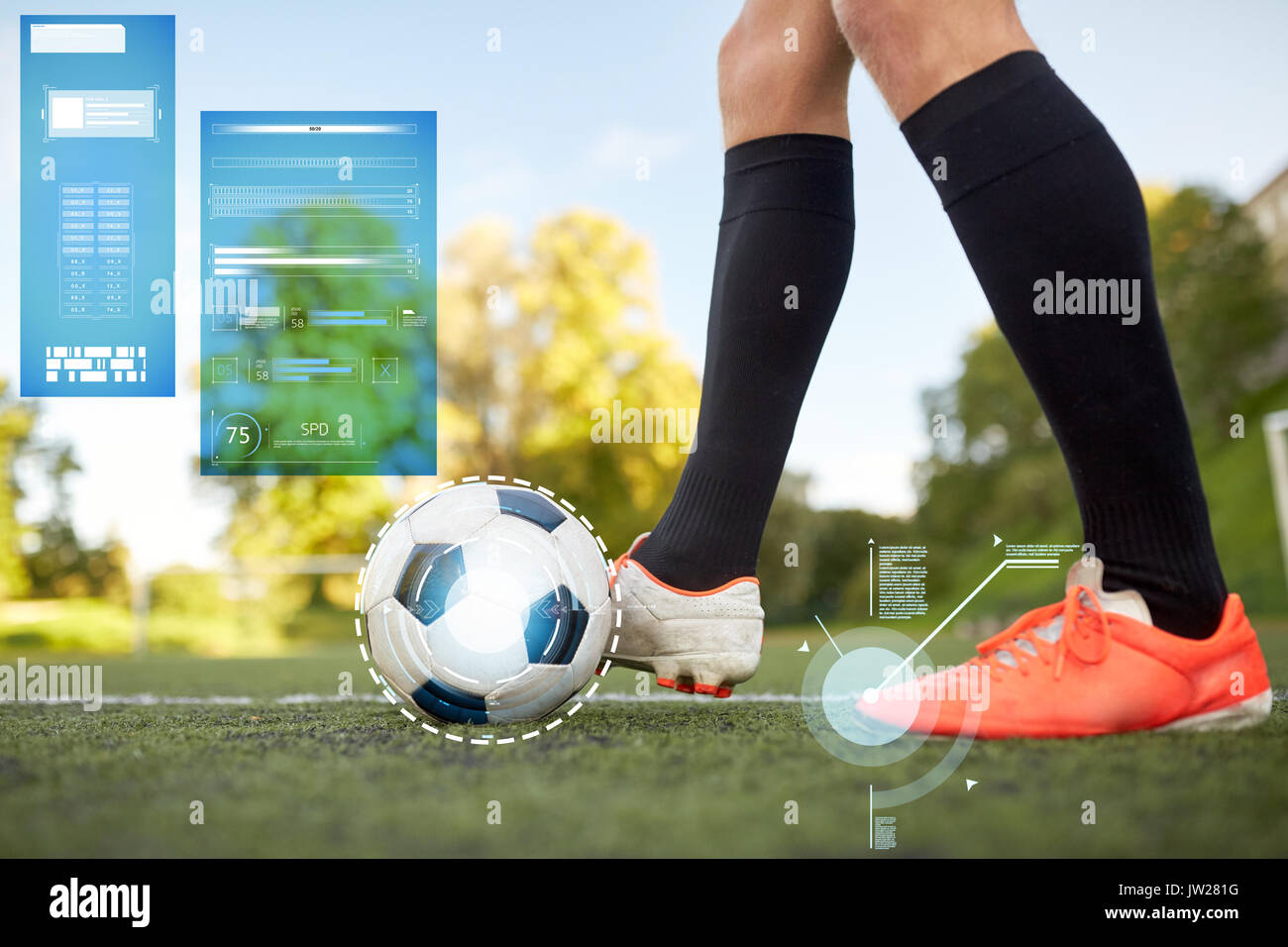 soccer player playing with ball on football field Stock Photo - Alamy