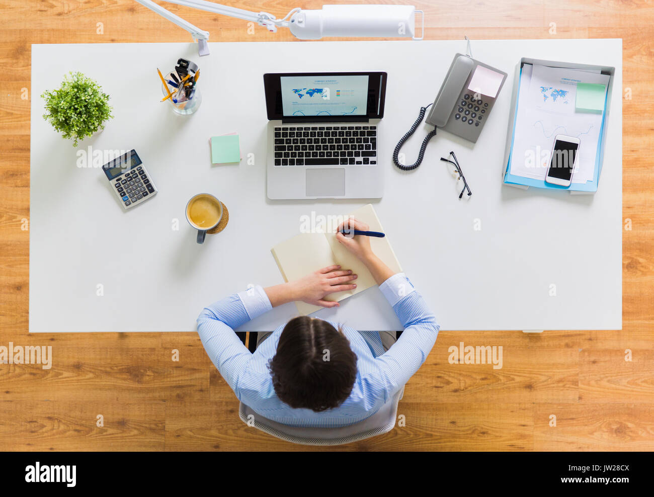 Office girl taking notes hi-res stock photography and images - Alamy