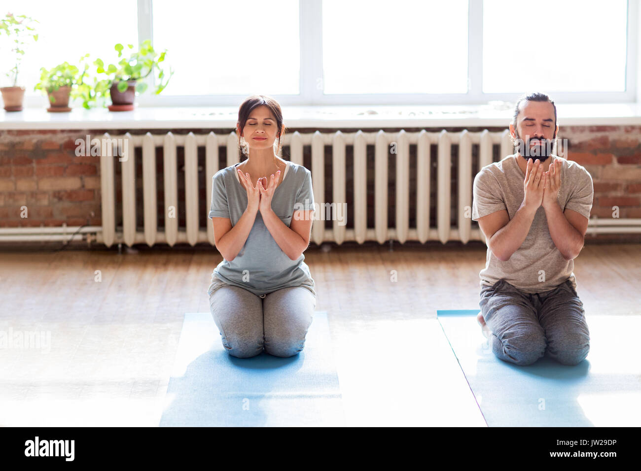 Yoga man woman hi-res stock photography and images - Alamy