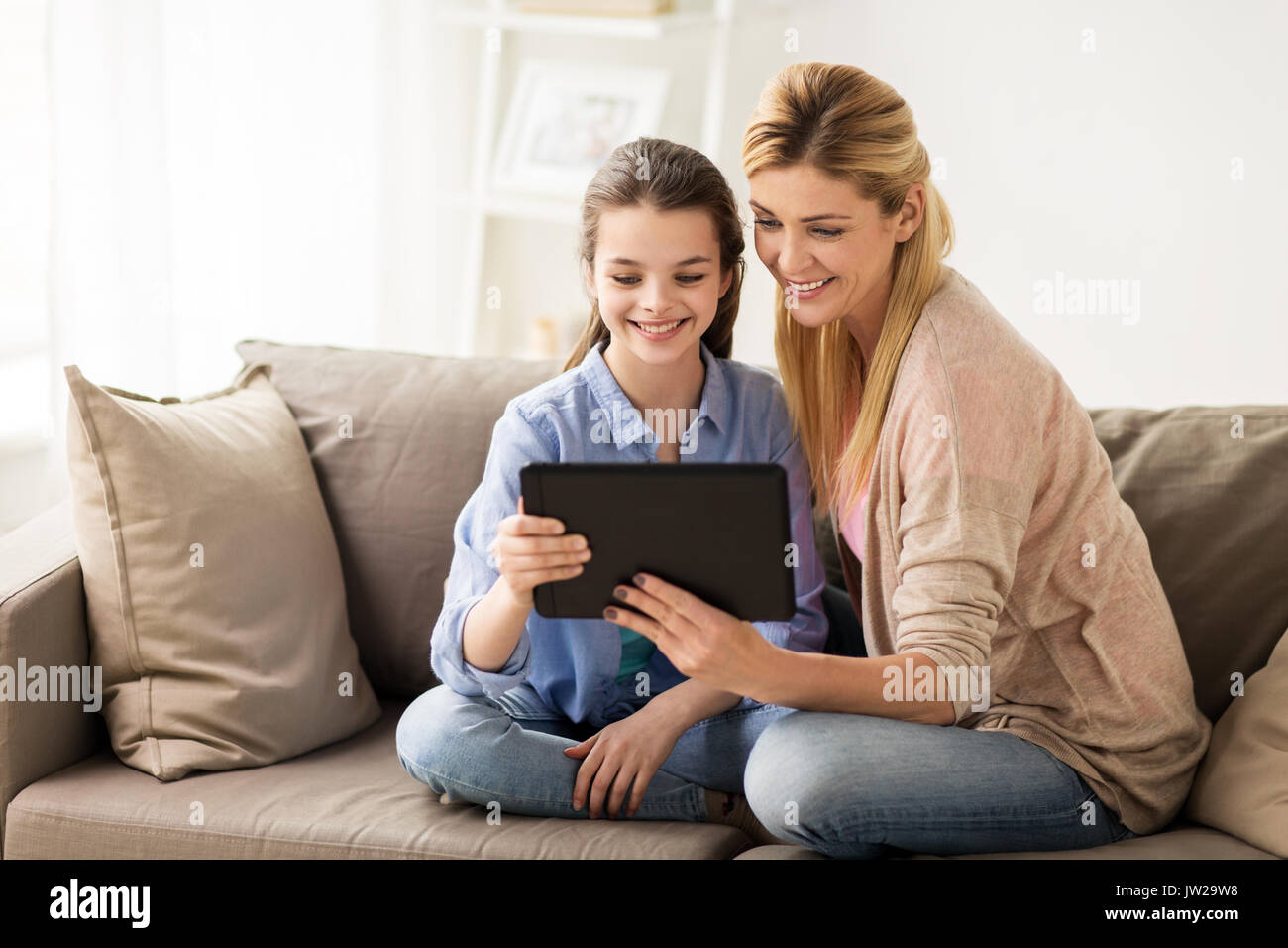 Family tablet hi-res stock photography and images - Alamy