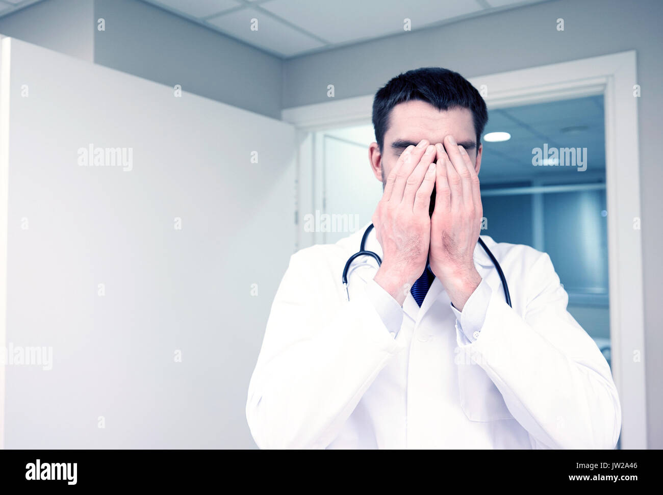 Crying doctor hi-res stock photography and images - Alamy