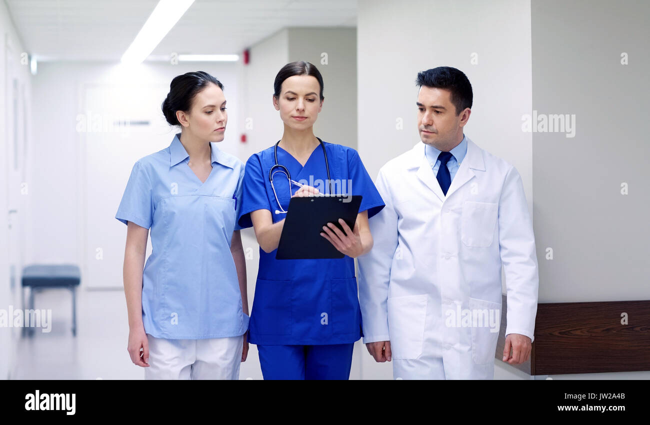 group of medics at hospital with clipboard Stock Photo - Alamy