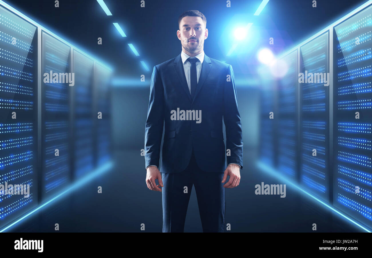businessman over server room background Stock Photo - Alamy