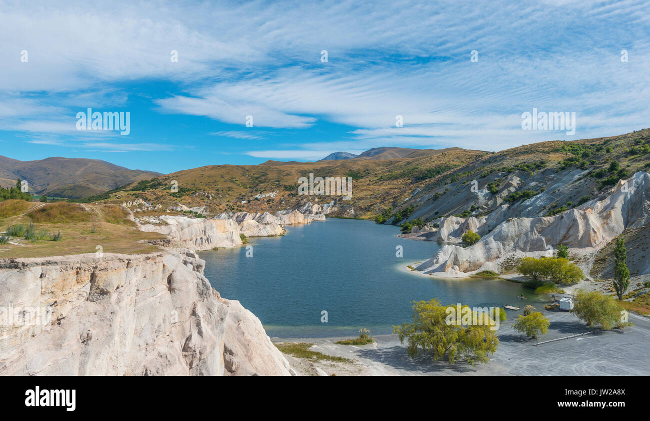 Lake surrounded by limestone cliffs, Blue Lake, St Bathans, Otago ...