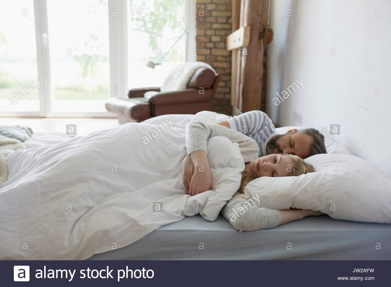 Two men sleeping together hi-res stock photography and images - Alamy