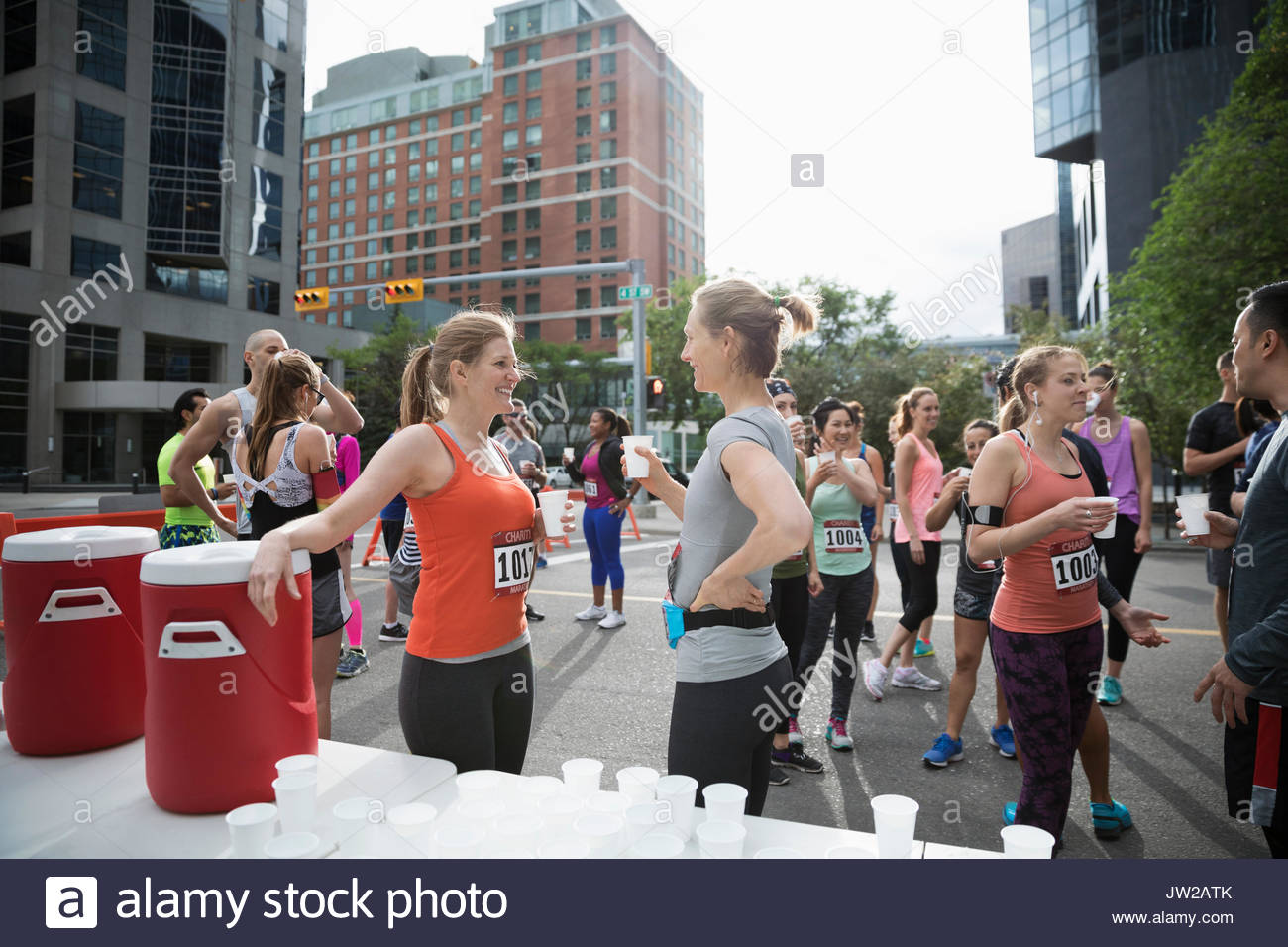 Female runners resting hi-res stock photography and images - Alamy