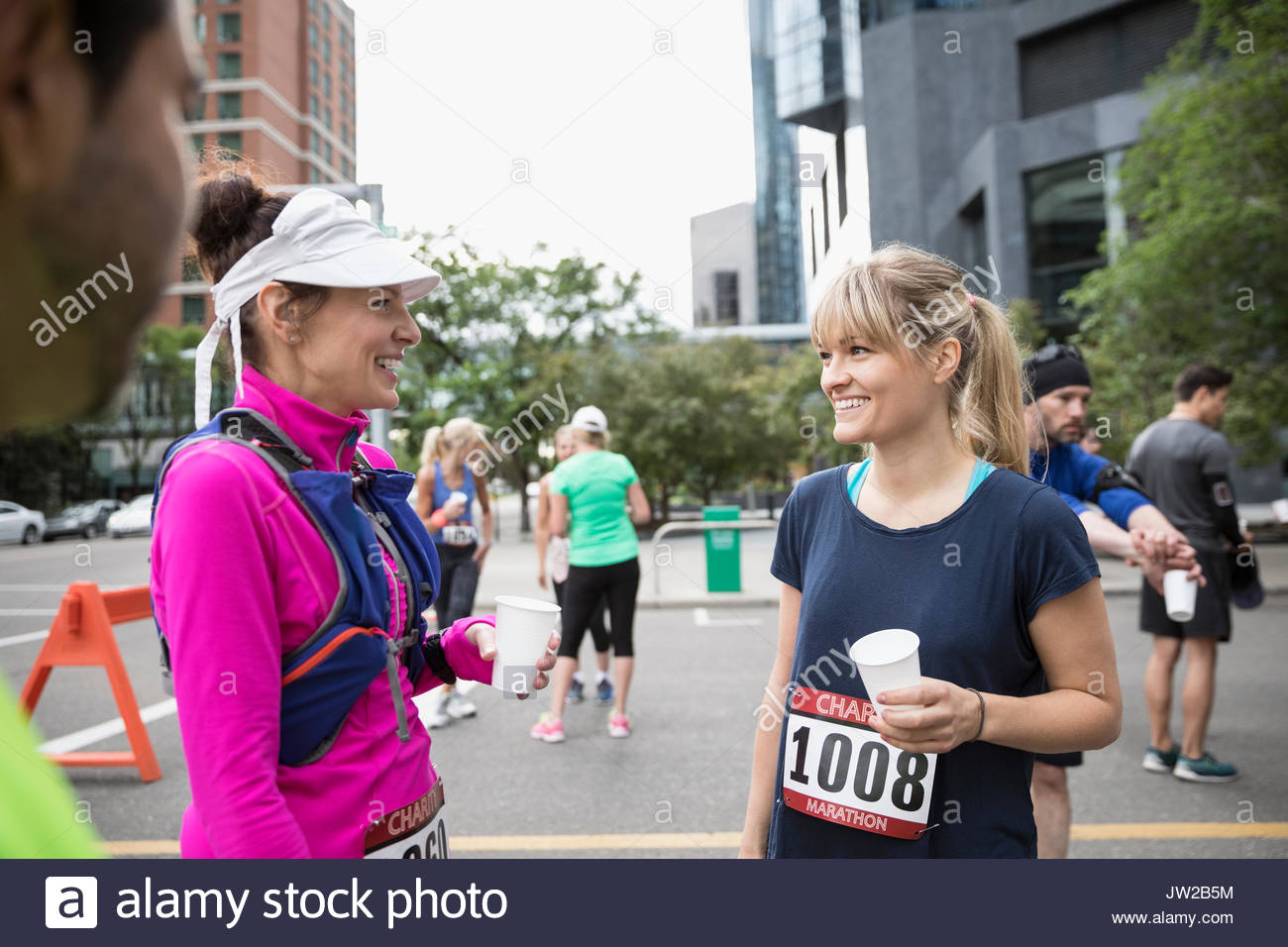 Female runners resting over hi-res stock photography and images - Alamy
