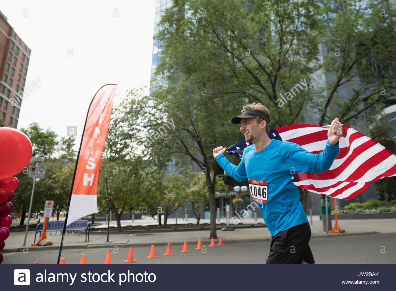 Running to finish line hi-res stock photography and images - Alamy