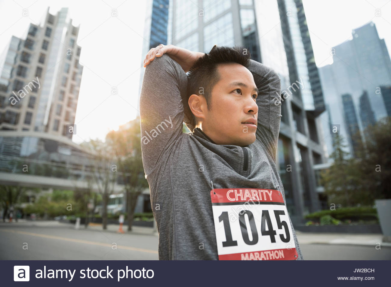 Runner arms up man hi-res stock photography and images - Alamy