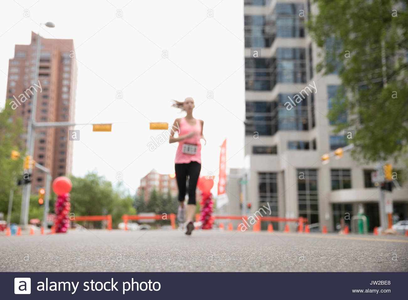 Female runner running on urban hi-res stock photography and images - Alamy