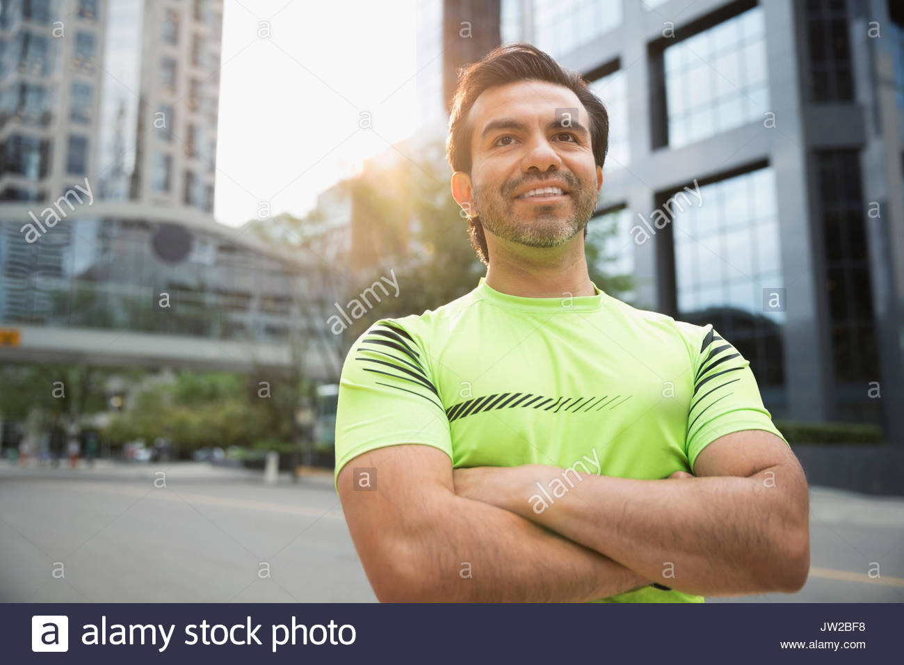Runner arms up man hi-res stock photography and images - Alamy