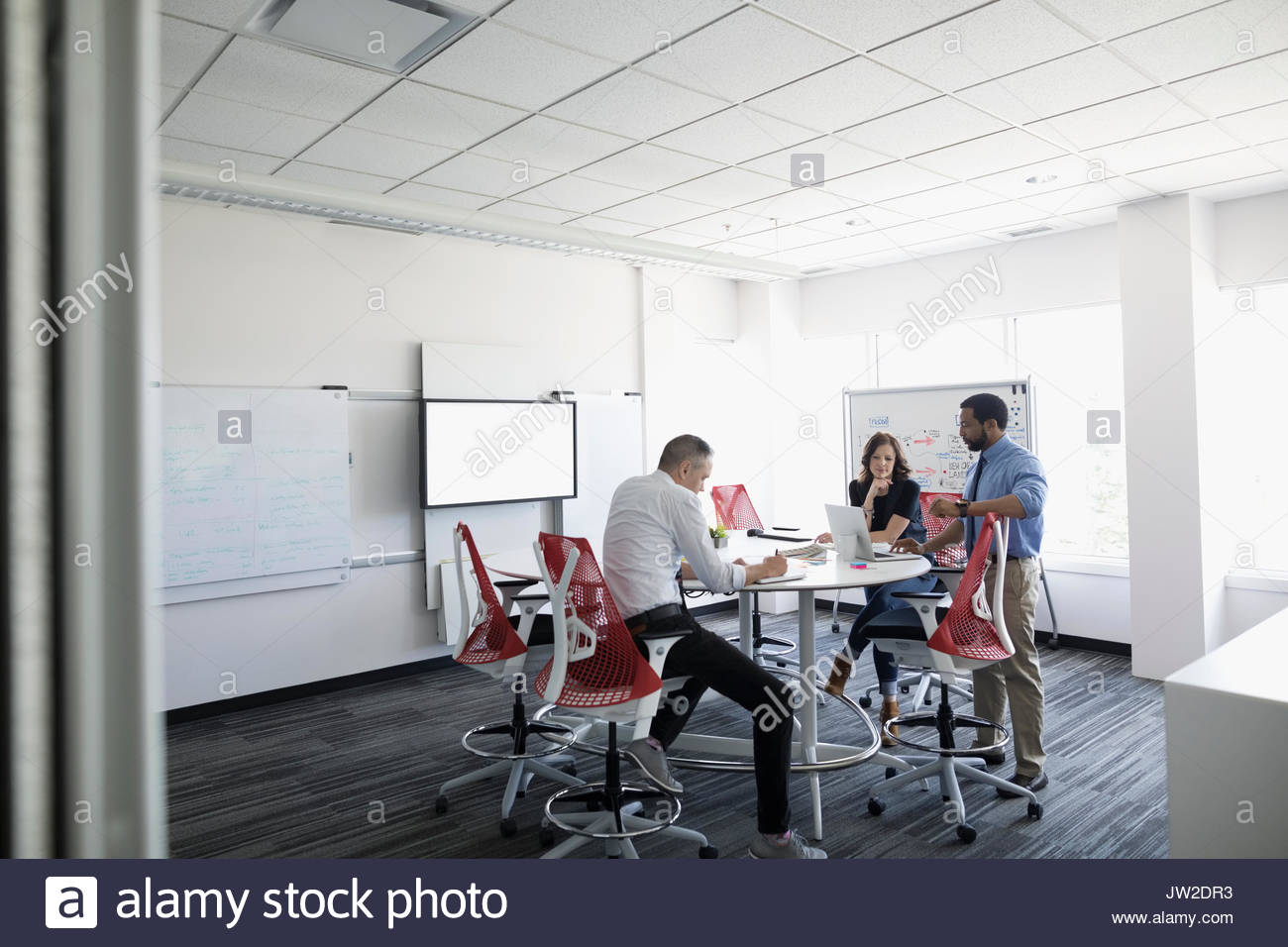 Business woman in conference room hi-res stock photography and images ...