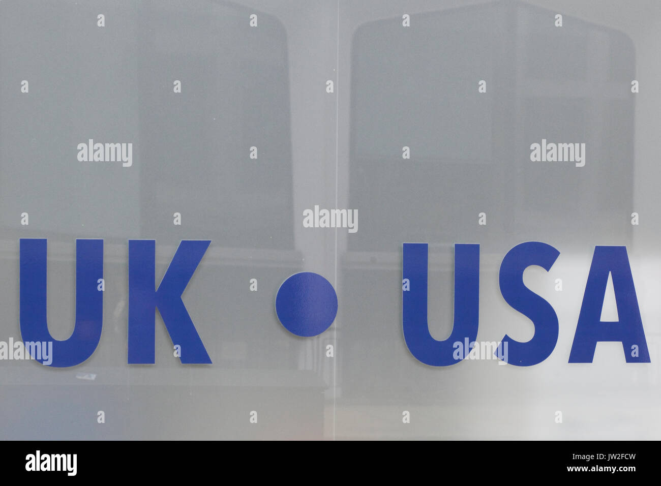 UK and USA sign on glass window Stock Photo - Alamy