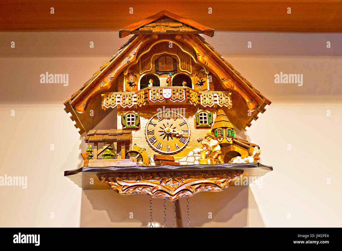 Wooden carved clock hi-res stock photography and images - Alamy