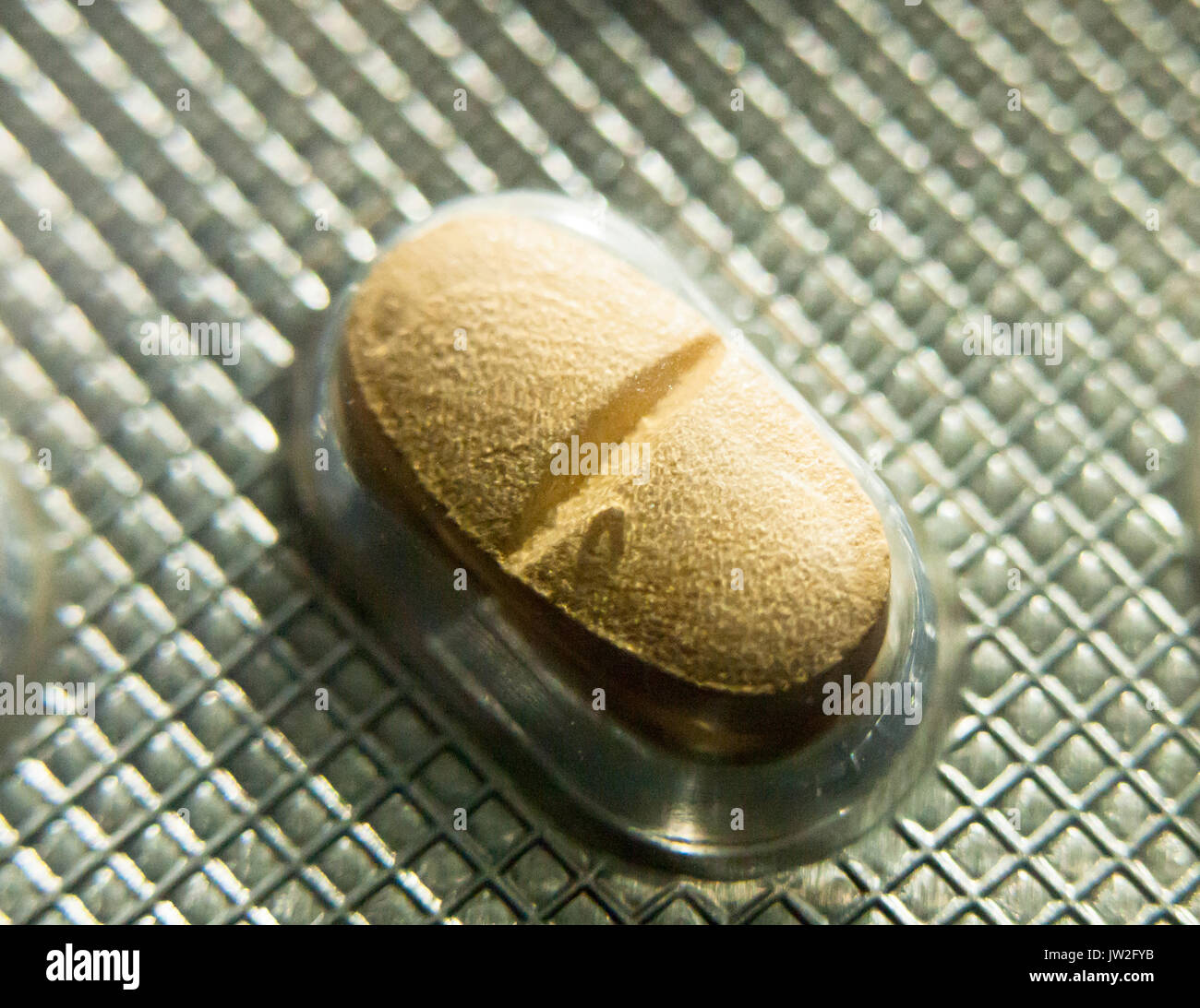 Yellow pill packet hi-res stock photography and images - Alamy