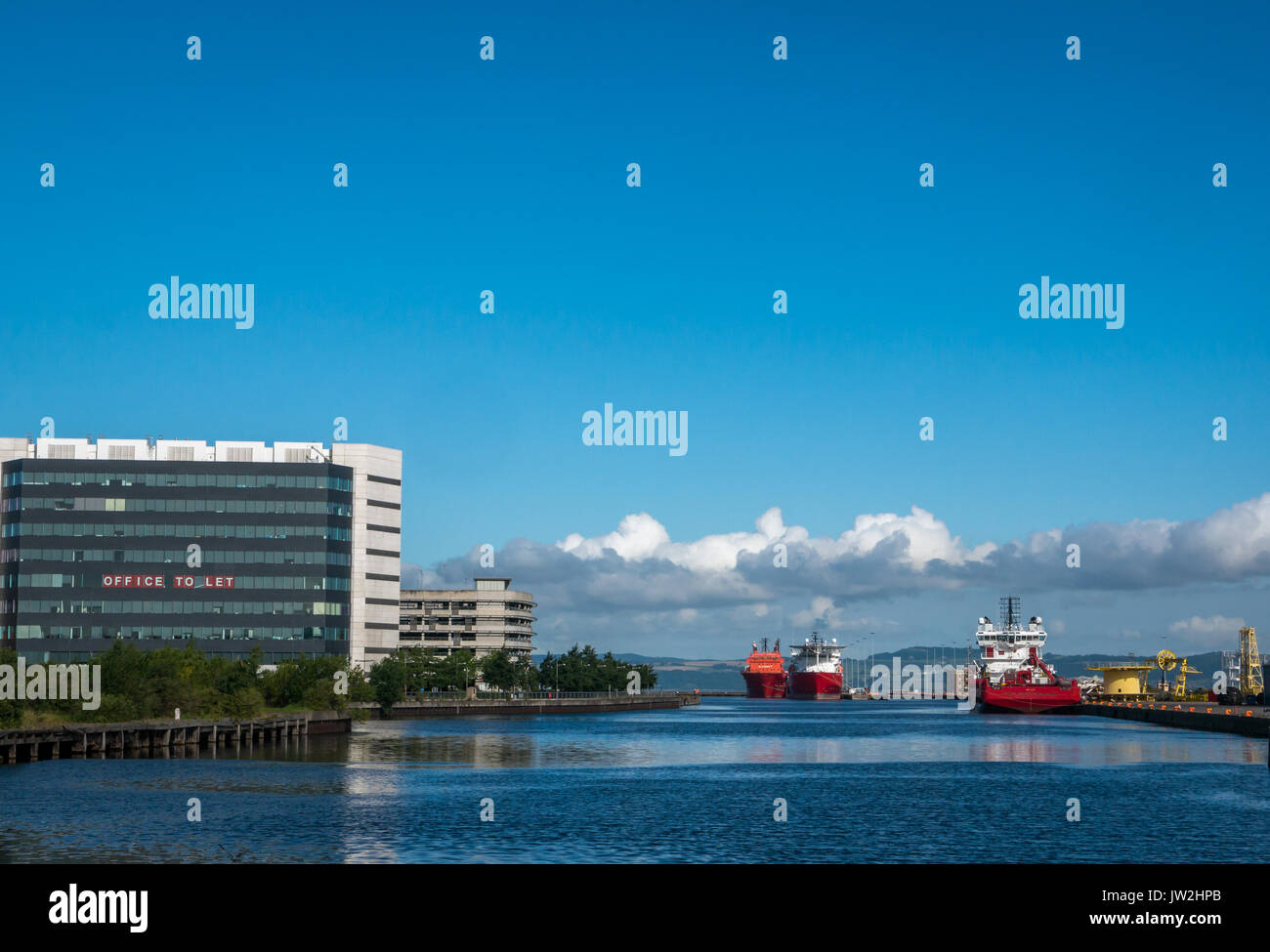 Albert Dock Basin, Leith, Edinburgh with offshore supply ships moored ...