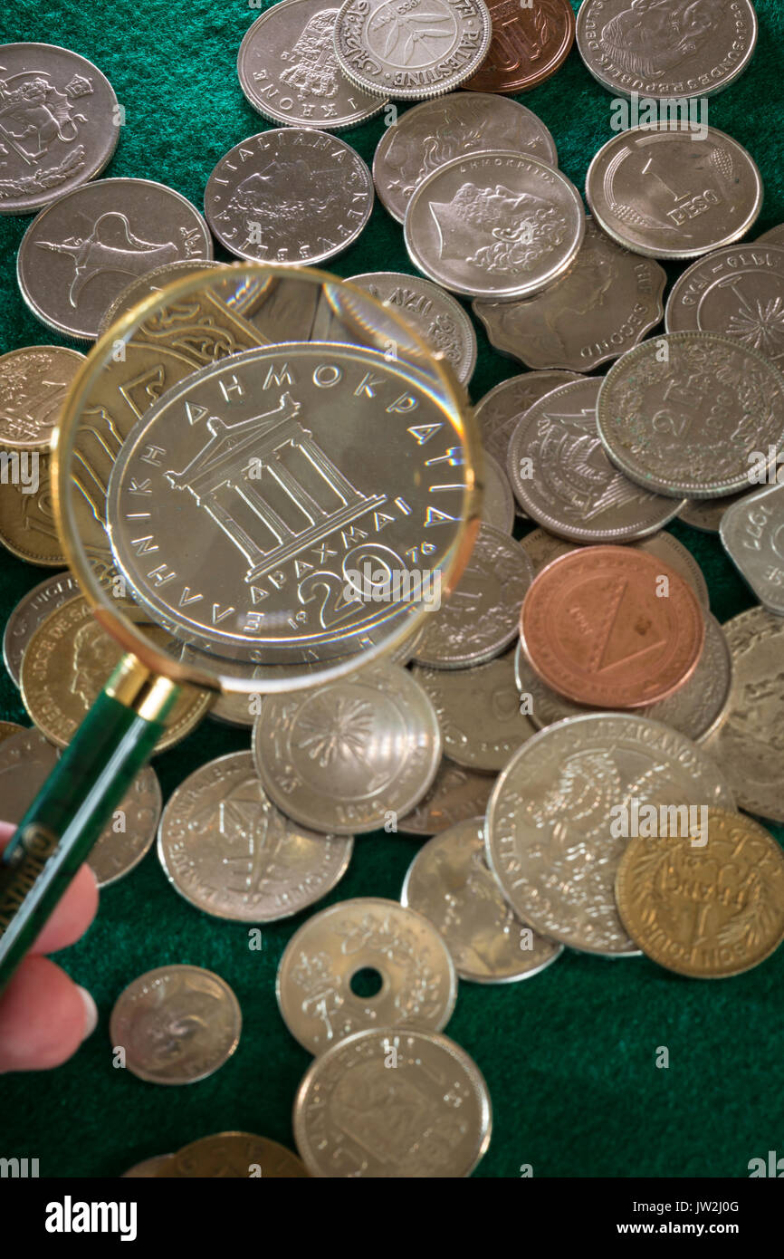 Multiple International Coins Stock Photo - Alamy