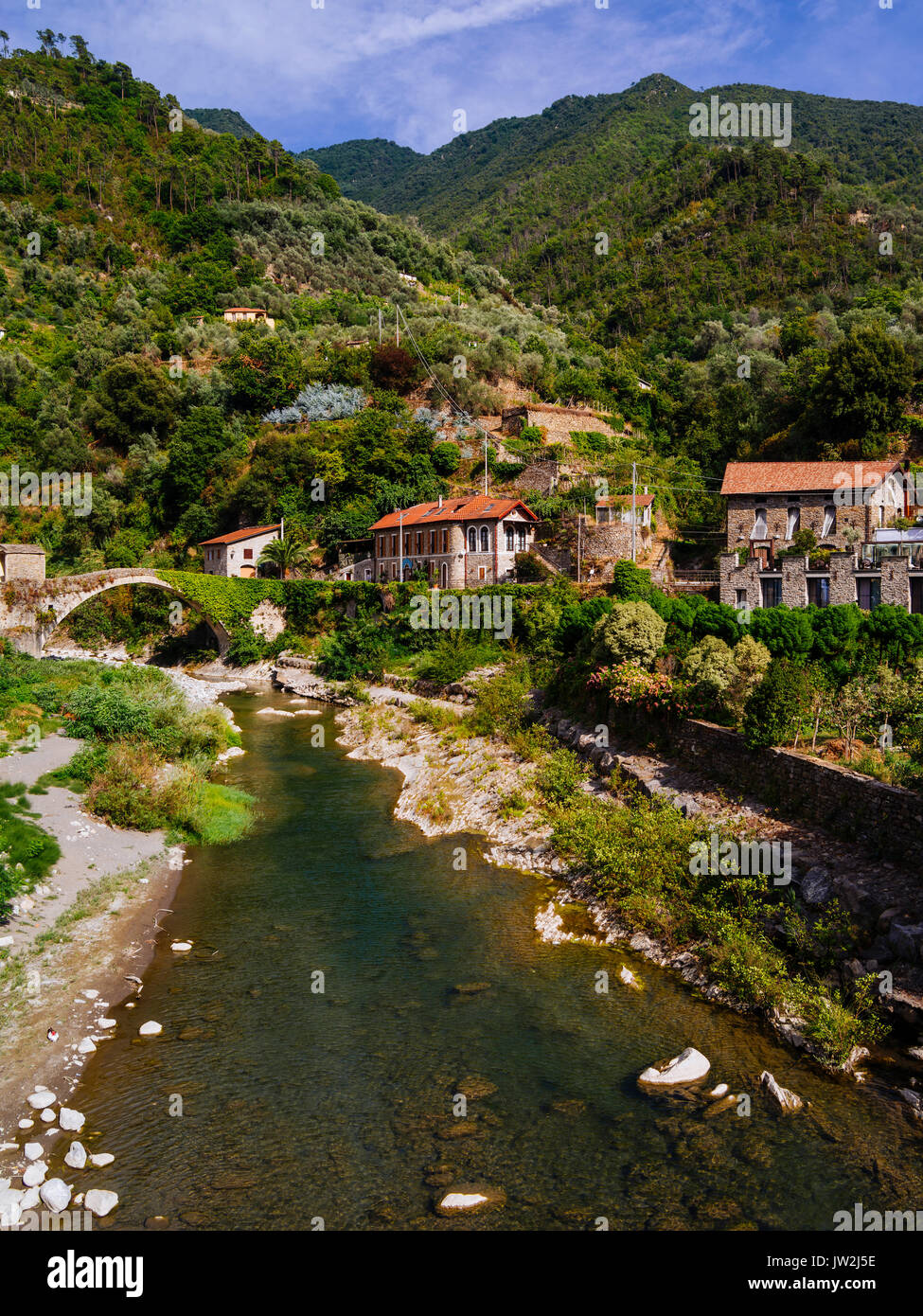 Photo of the stone bridge and river in the small old town of Badalucco ...