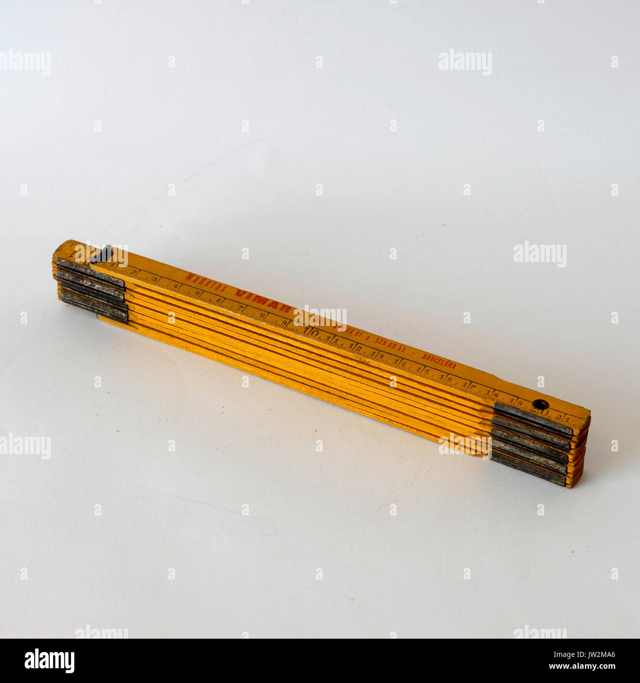 Vintage meter made by wood and yellow painted Stock Photo - Alamy