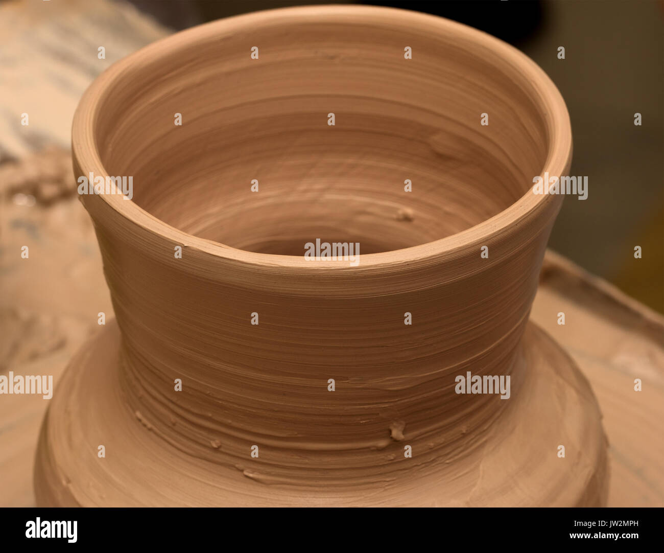 Process of making clay vase on pottery wheel. Close-up view Stock Photo ...