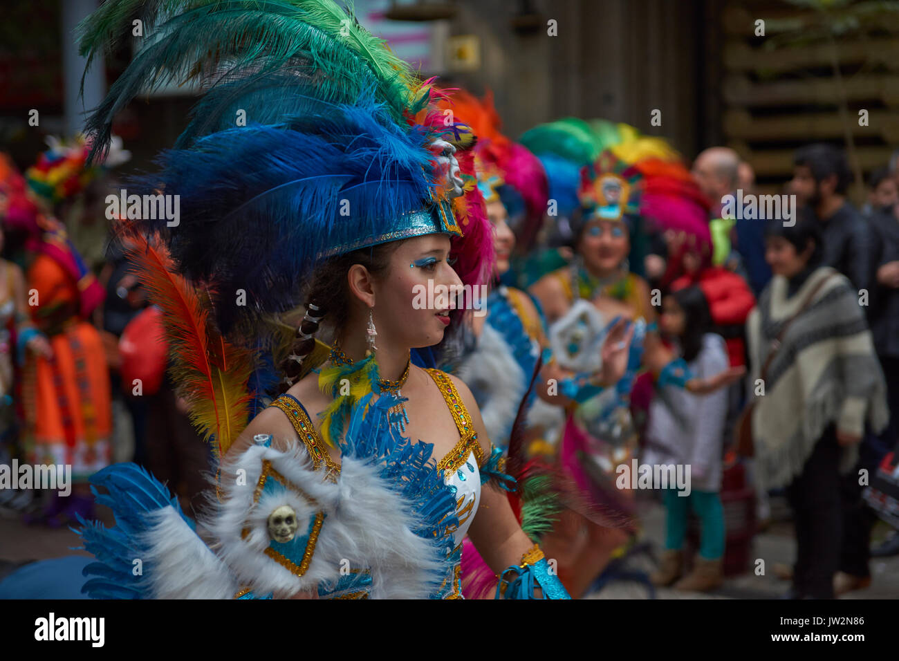 Tobas dance group parading through the centre of Santiago, Chile to ...
