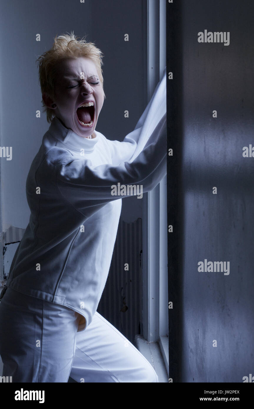 Straight jacket mental hi-res stock photography and images - Alamy