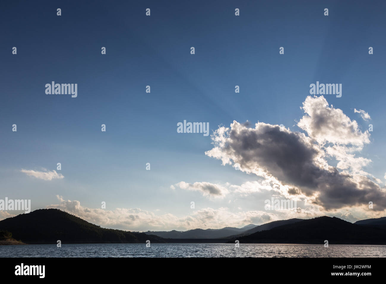 Sun coming out of the clouds hi-res stock photography and images - Alamy