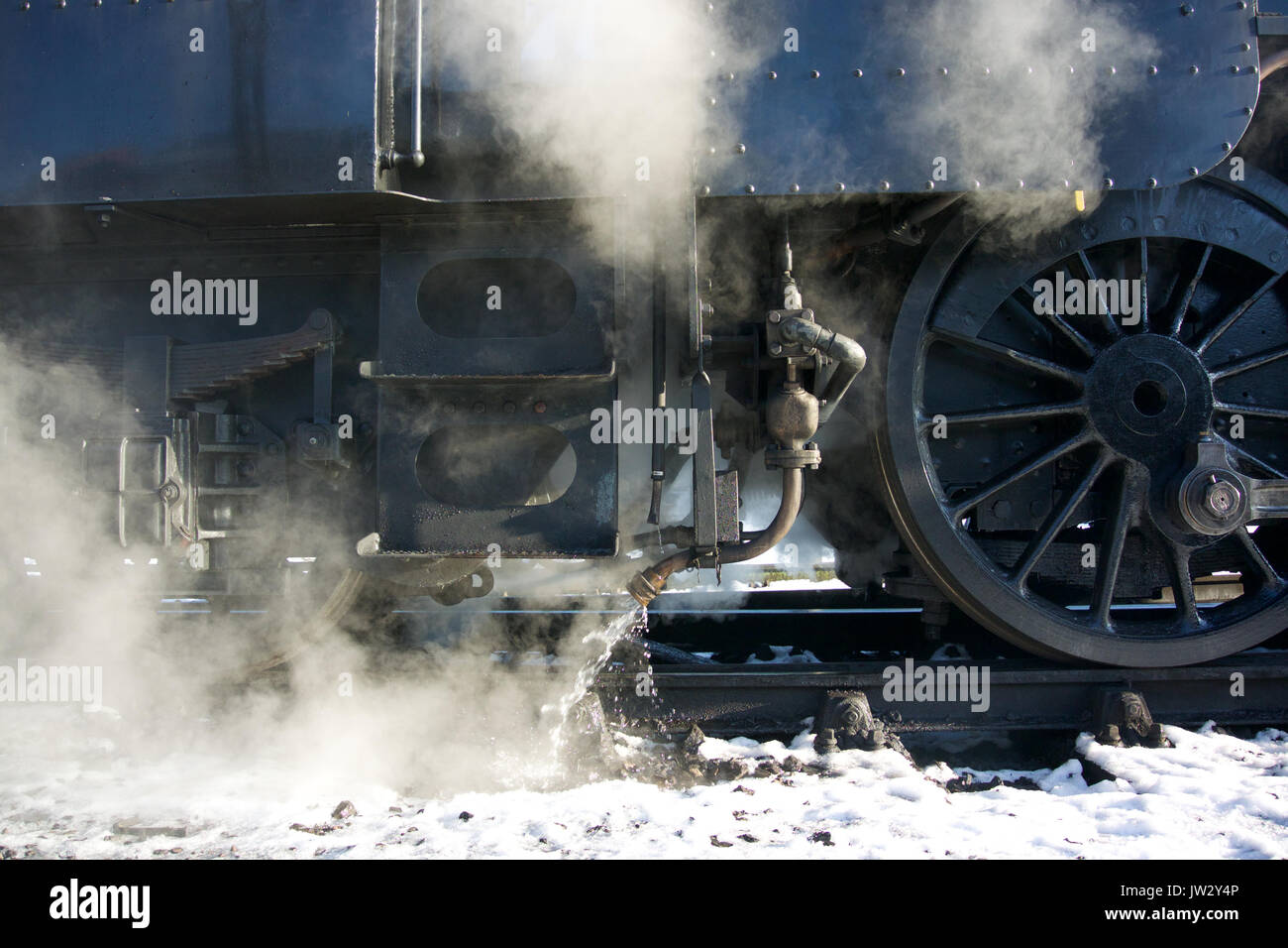 Steam train on winters morning with snow on the ground Stock Photo - Alamy