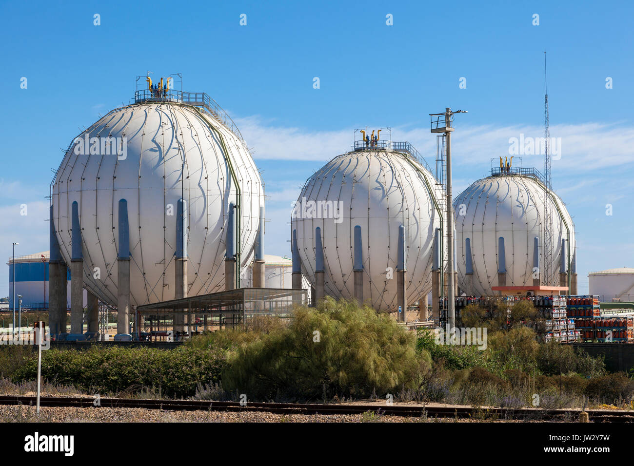 Spherical gas tanks at an industrial refinery Stock Photo - Alamy