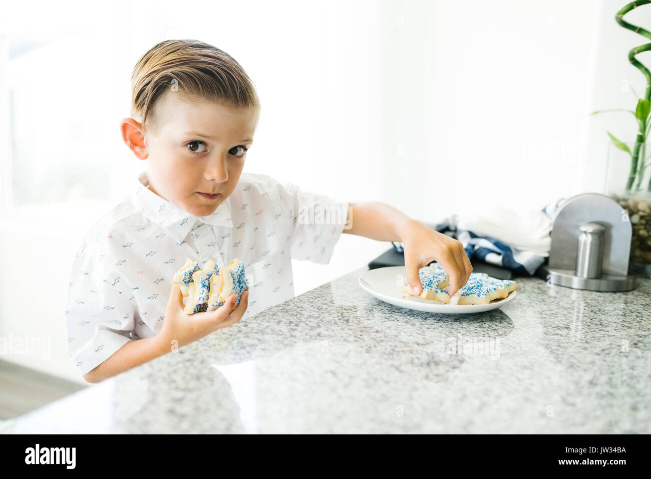 Boy stealing food hi-res stock photography and images - Alamy