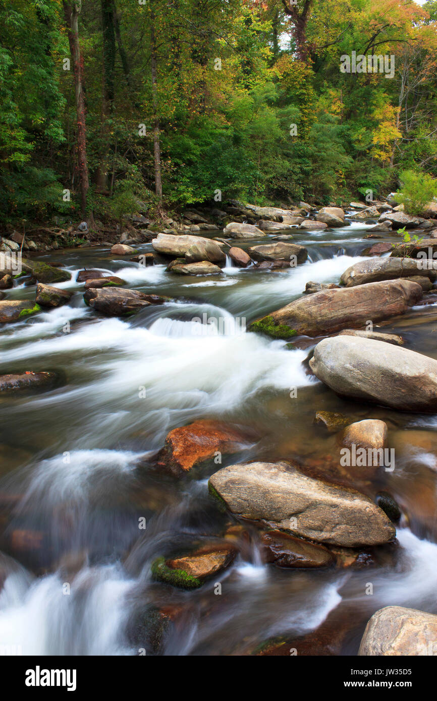 Fast moving river water at Buffalo Creek Chimney Rock Village near lake ...