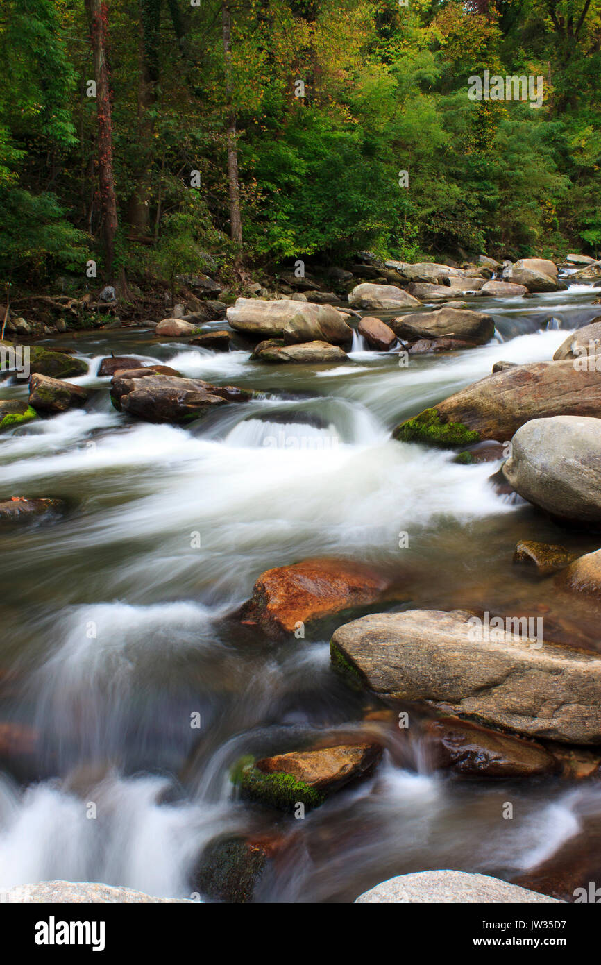 Fast moving river water at Buffalo Creek Chimney Rock Village near lake ...