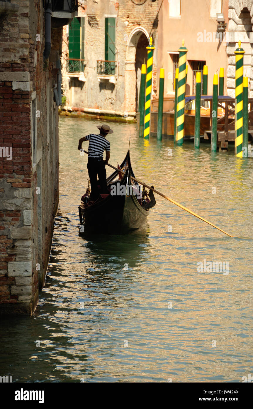 typical venetian gondola with gondoliere, Venice, Italy Stock Photo - Alamy