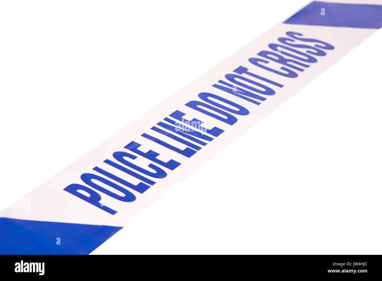 Blue, angled police line do not cross crime scene tape close up and ...