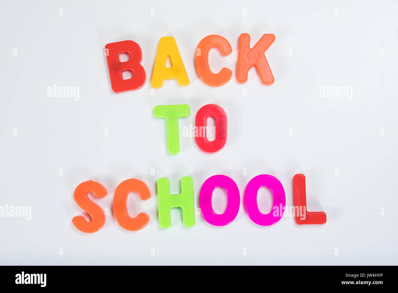 Back to school written with colourful alphabet learning letters on a ...