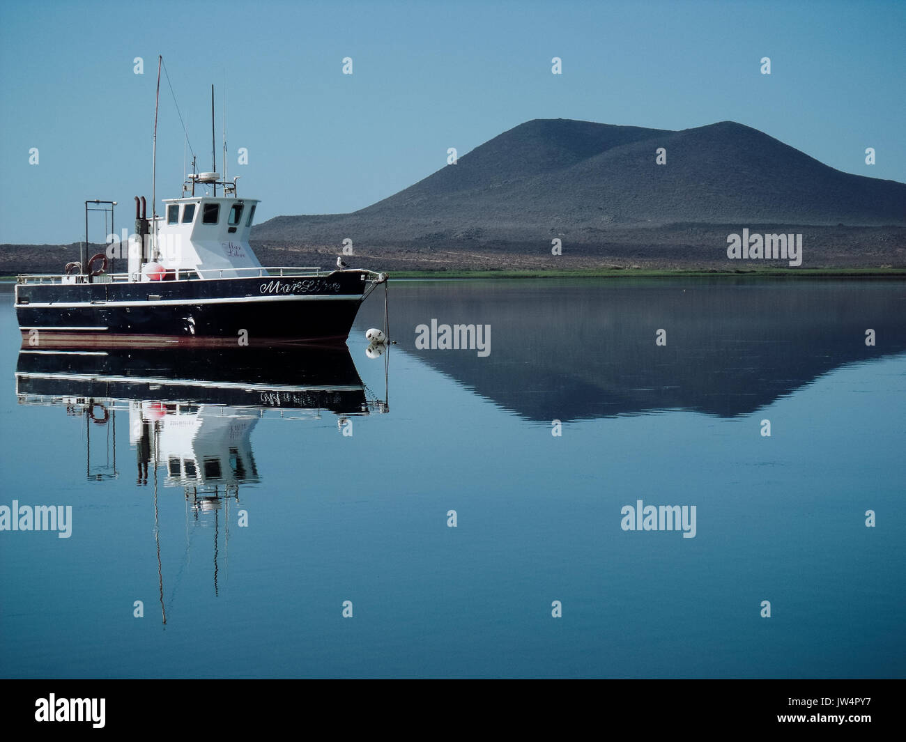 Boat Reflection in Water Stock Photo - Alamy