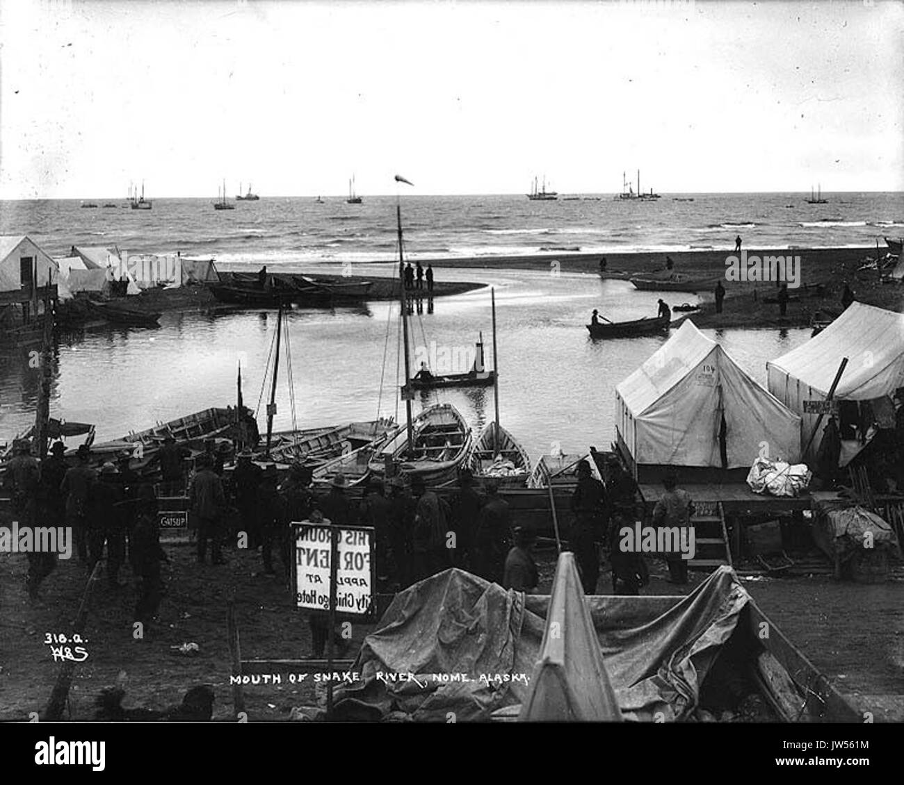 Boats and tents at the mouth of the Snake River, Nome, Alaska, ca 1900 ...