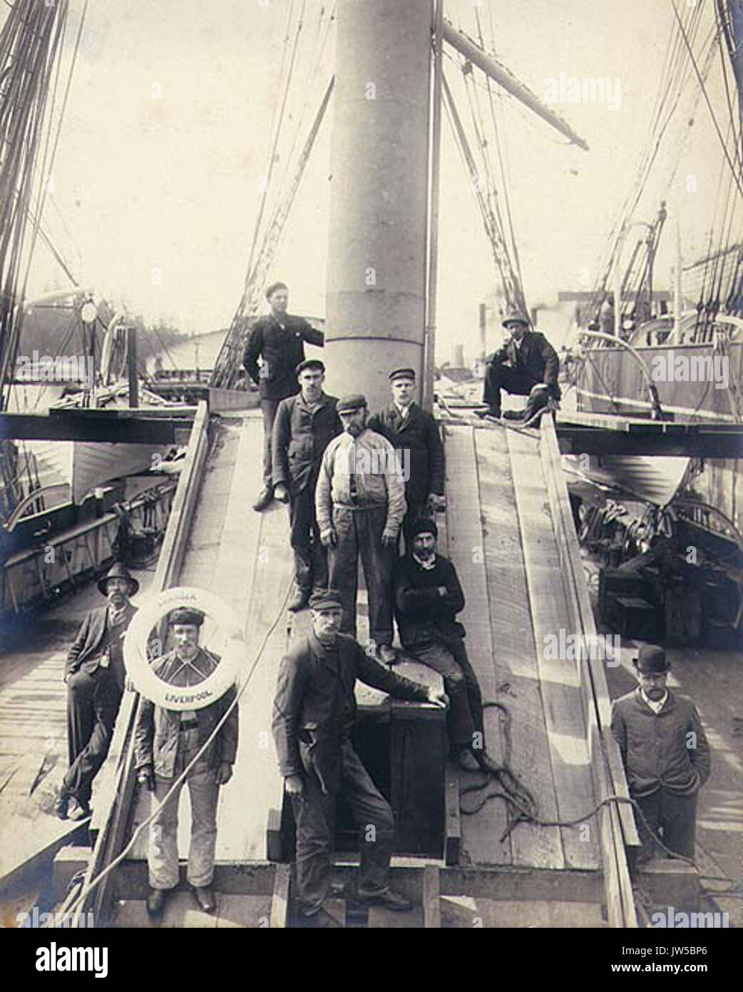 Crew on the deck of the bark EURASIA, probably Port Blakely, Washington ...