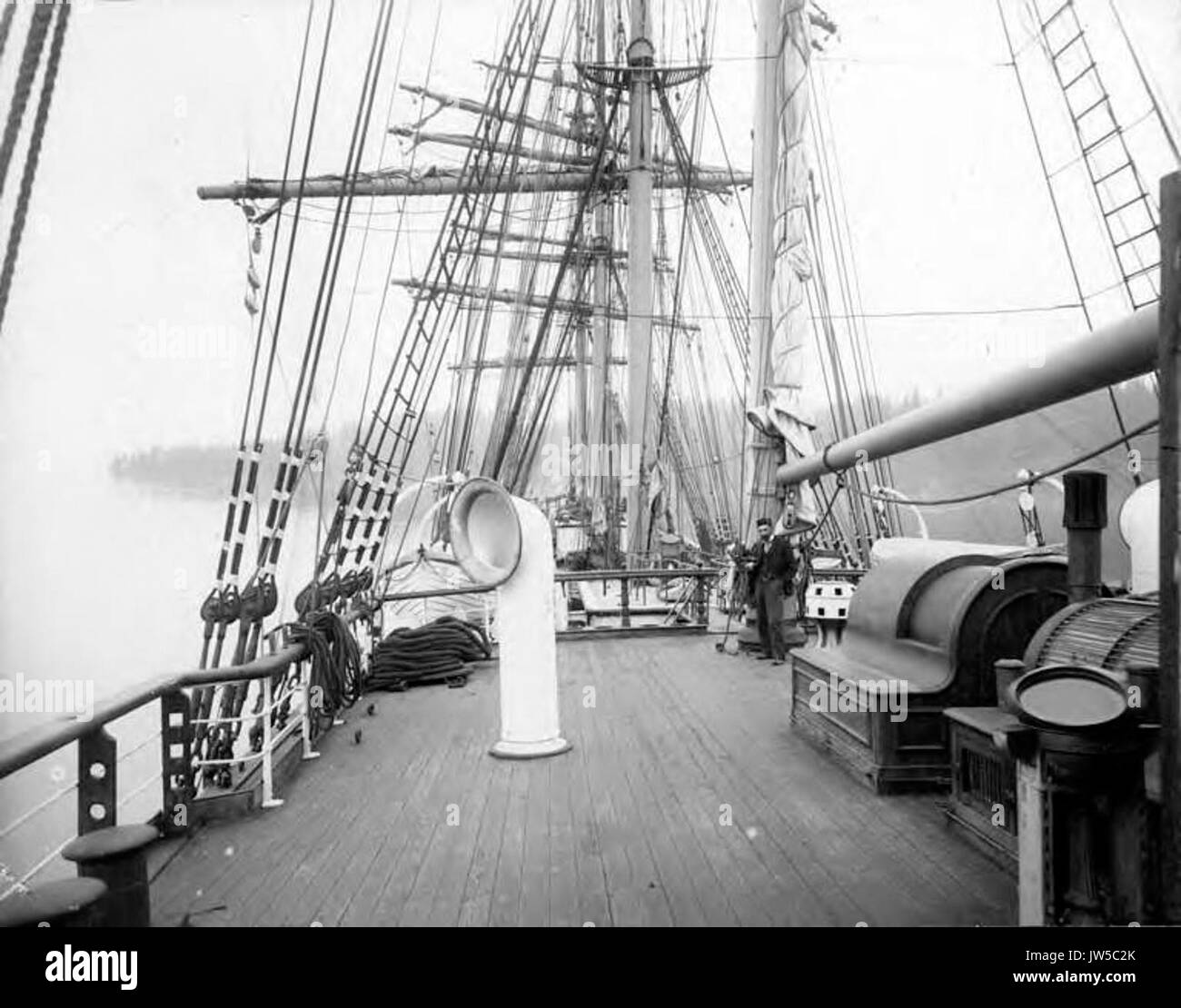 Crew member of British four masted bark IVERNA on deck, Washington, ca ...