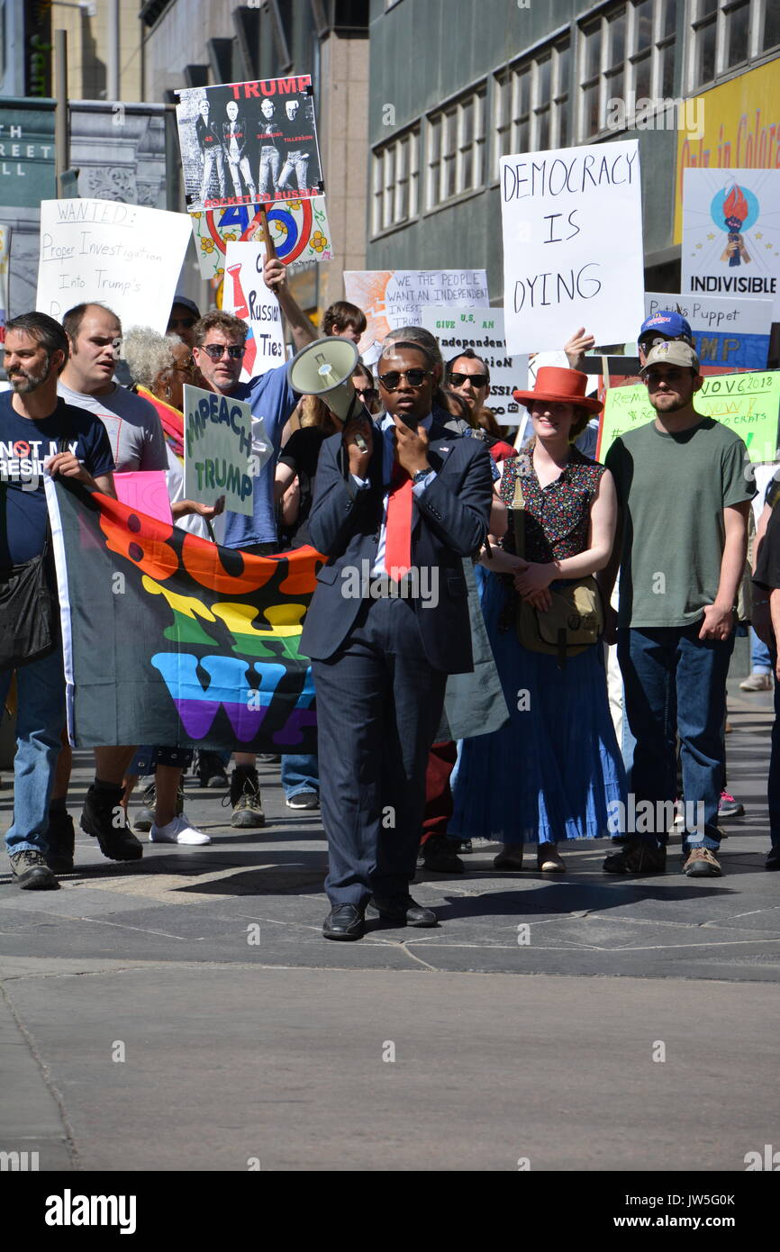 Protesters marching with signs hi-res stock photography and images - Alamy