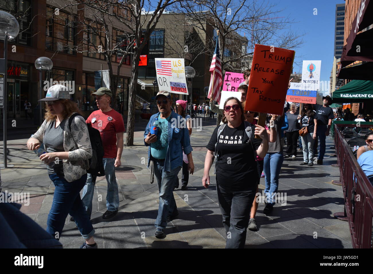 Protesters marching with signs hi-res stock photography and images - Alamy