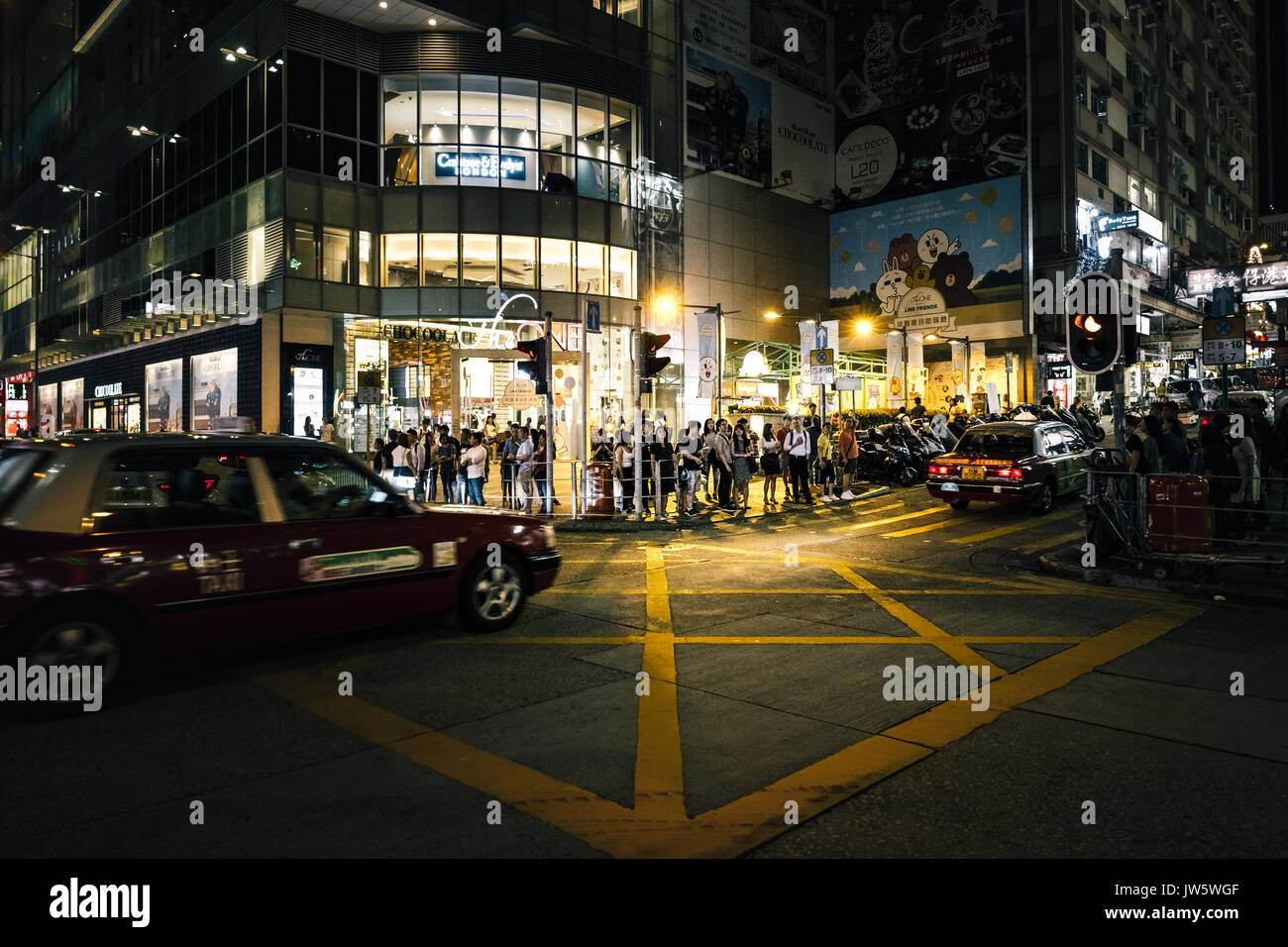 Hong Kong famous street at night in Tsim Sha Tsui Stock Photo - Alamy
