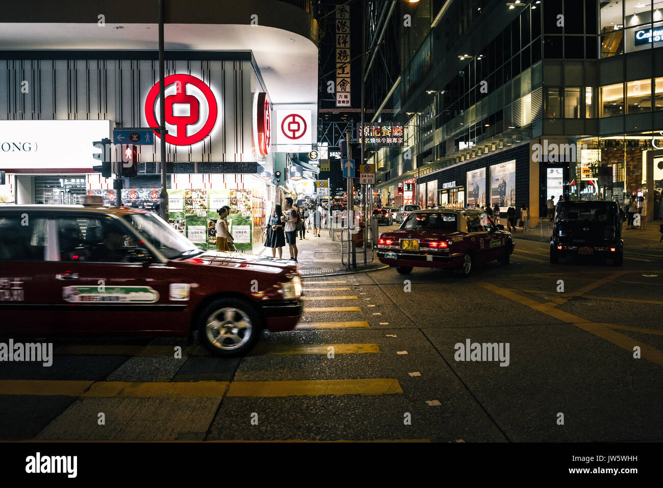 Hong Kong famous street at night in Tsim Sha Tsui Stock Photo - Alamy